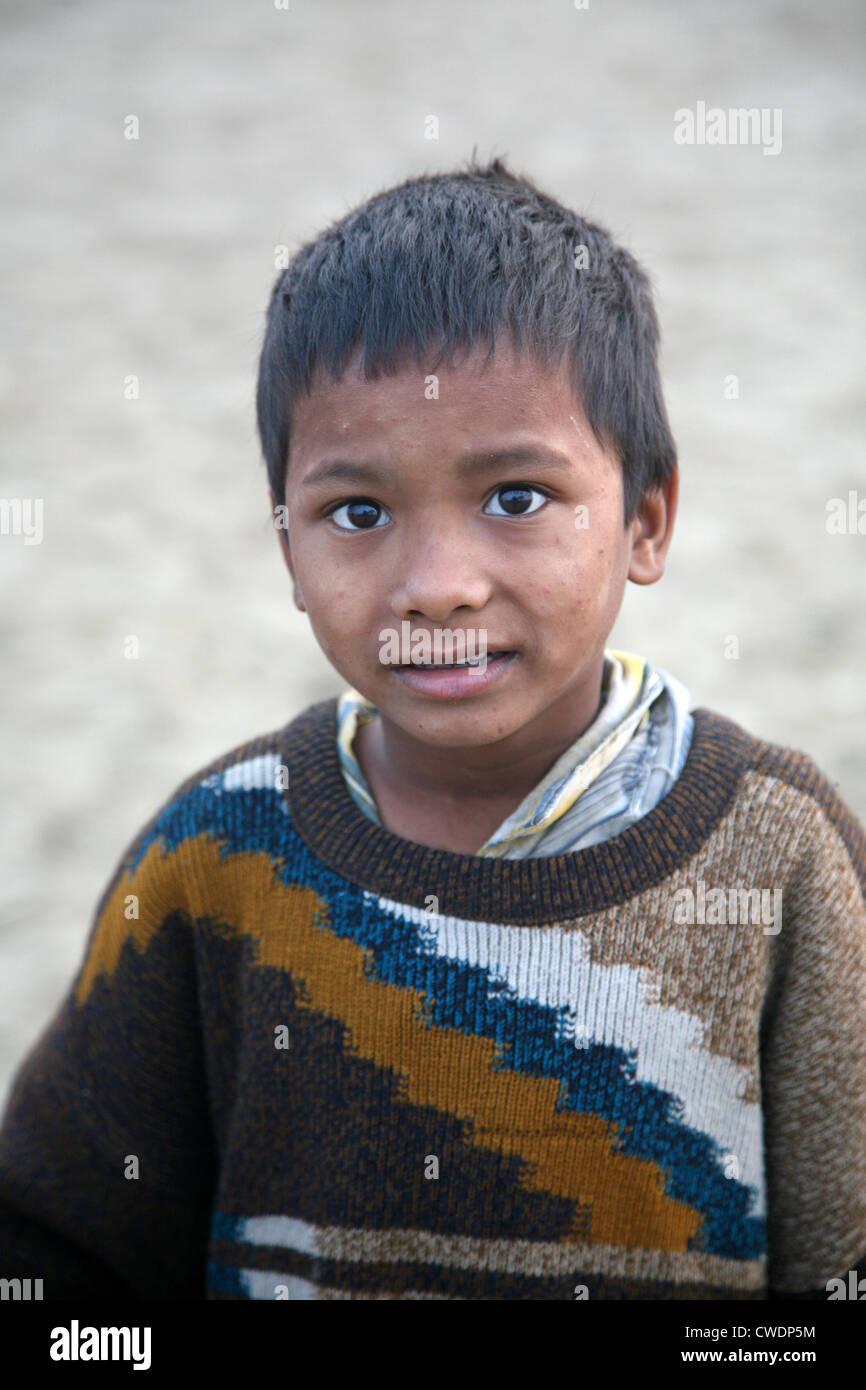 Portrait of boy on street on January 14, 2009 in Kumrokhali, West ...