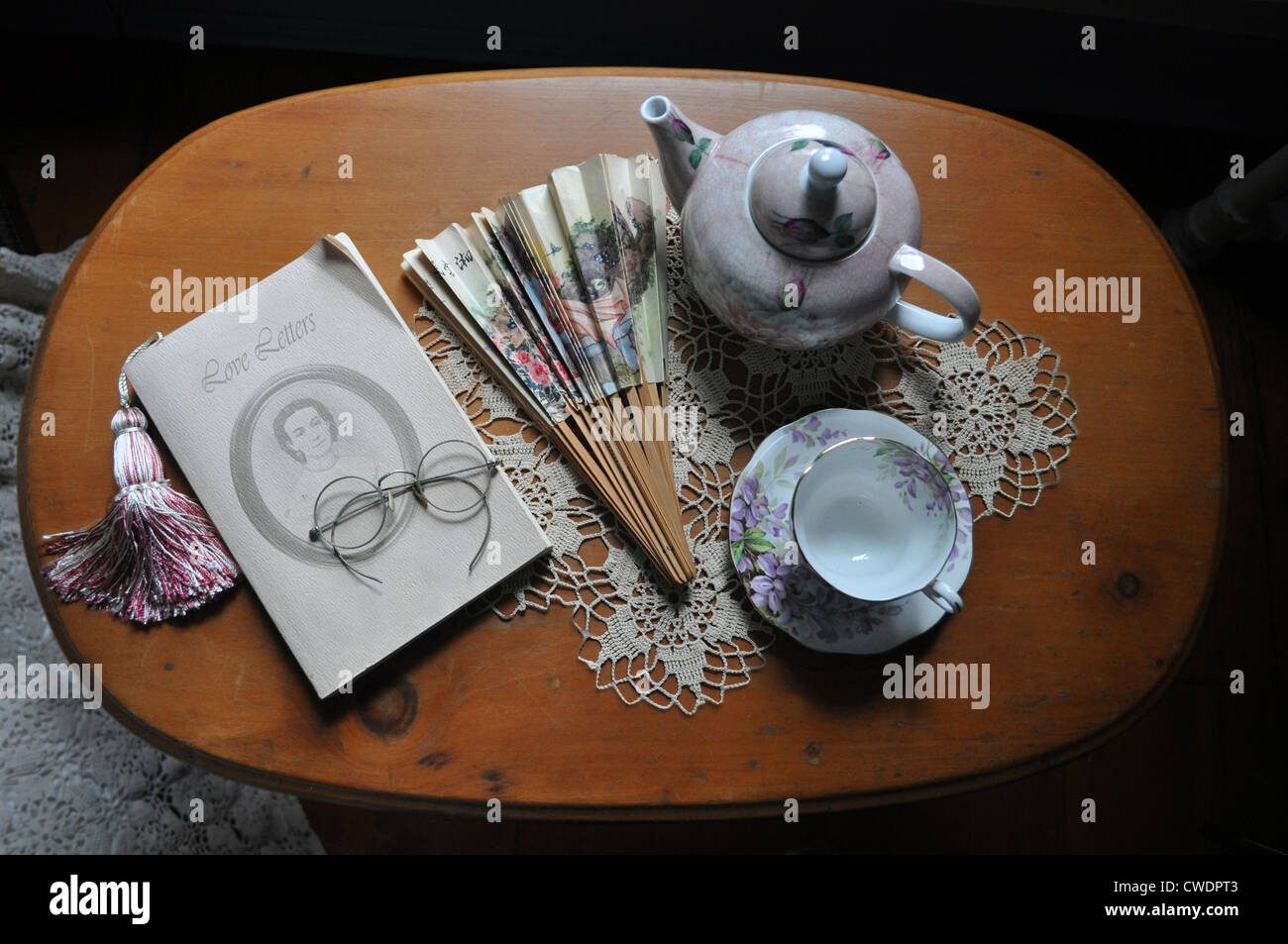Victorian ladies tea table with love letters and fan Stock Photo - Alamy
