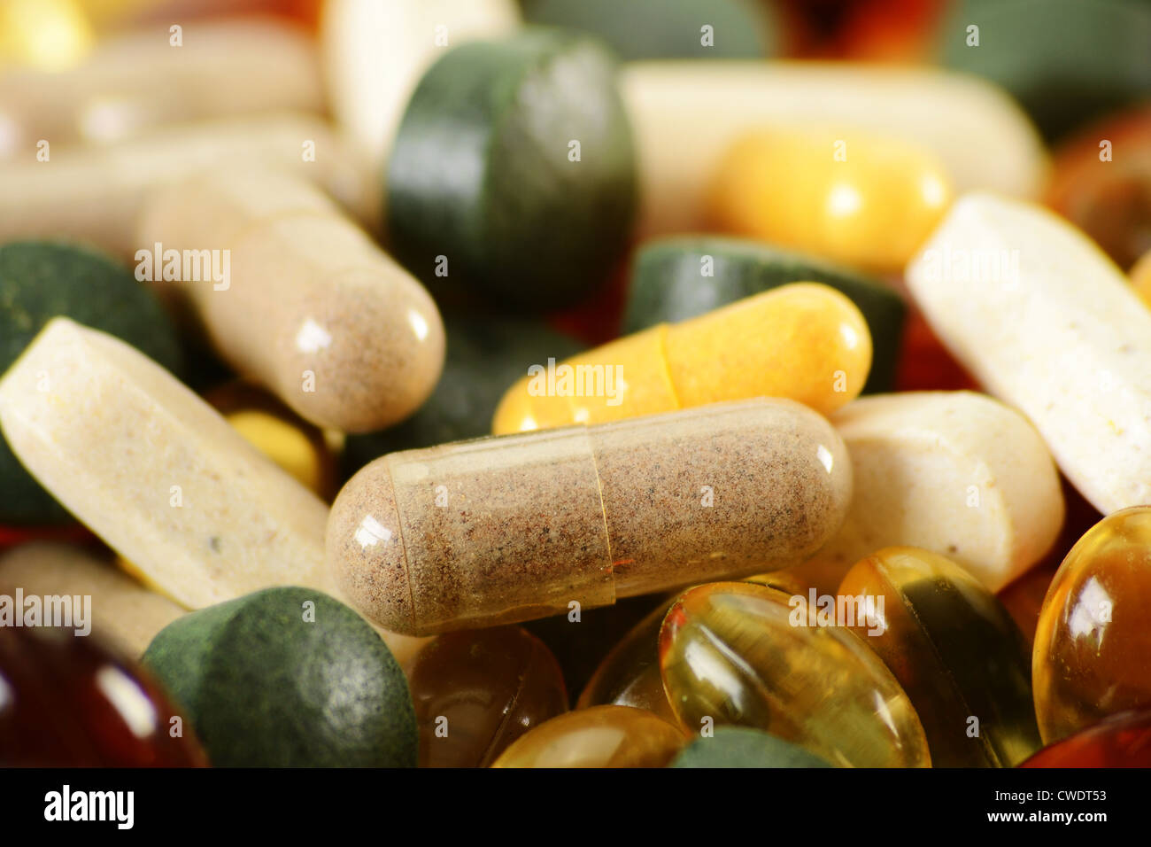 Composition with dietary supplement capsules and tablets Stock Photo ...