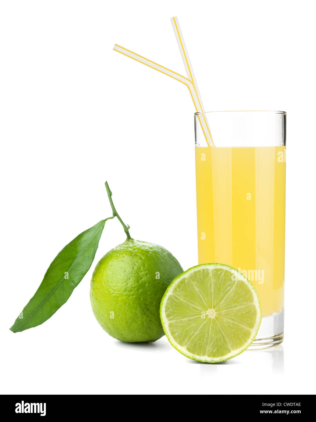 Lime juice glass with ripe limes. Isolated on white background Stock ...