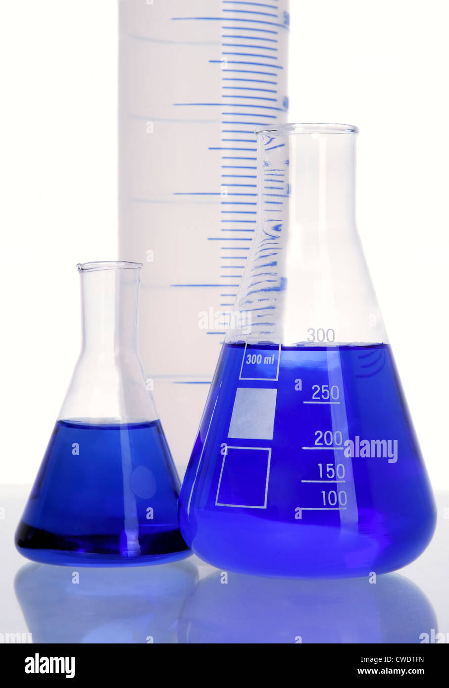 There are three flasks with blue fluid Stock Photo - Alamy