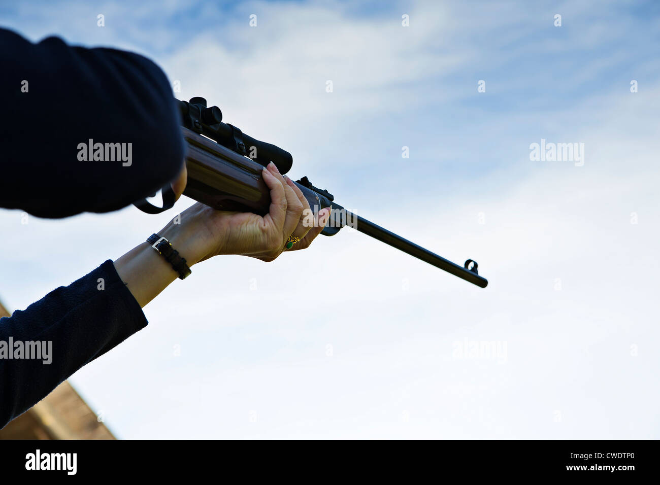 Sniper targeting with hand weapon through optical sight Stock Photo - Alamy