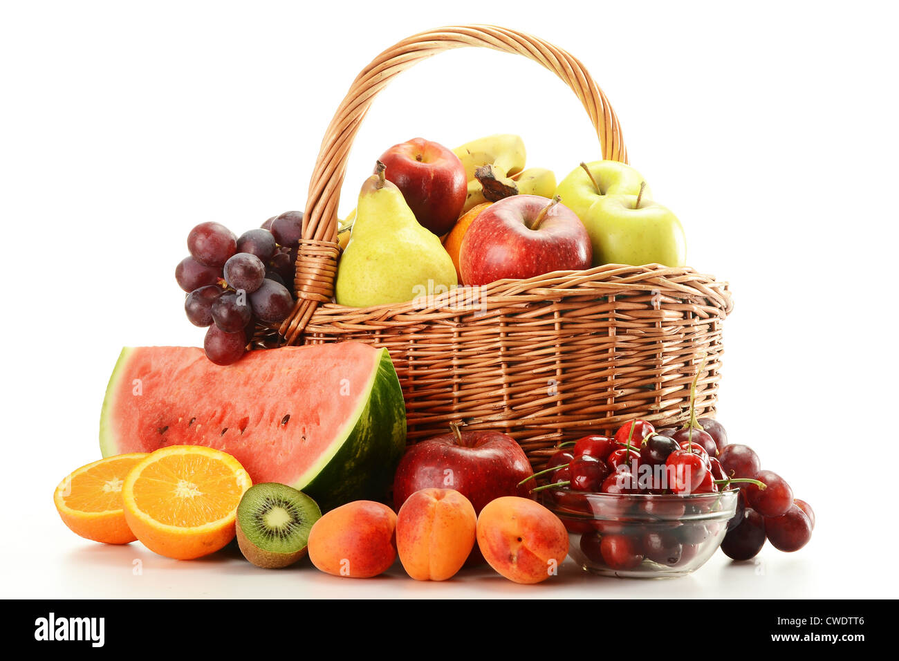 Composition with variety of fruits and wicker basket Stock Photo - Alamy