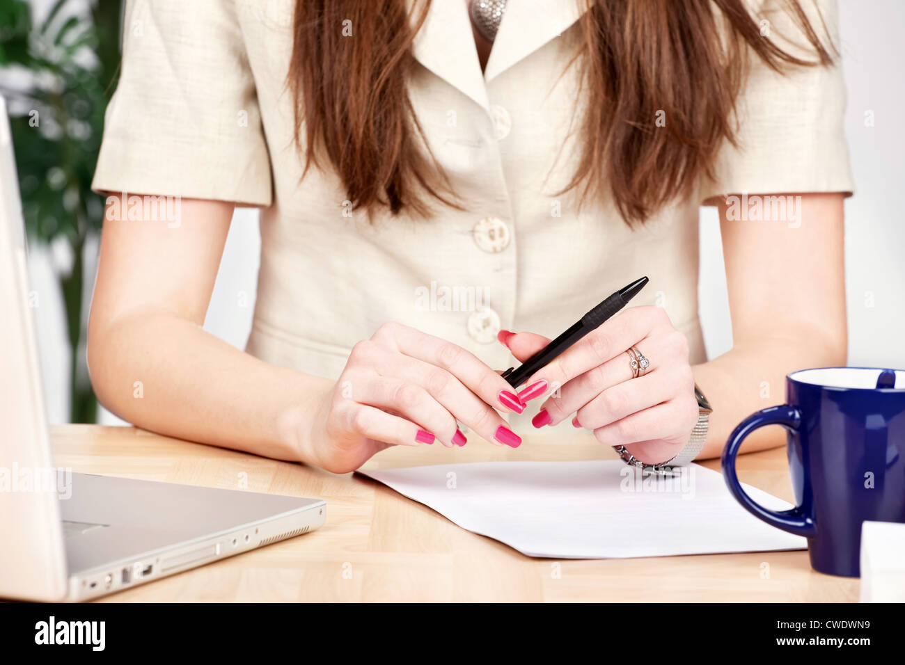 pen in a hands of a business woman in office Stock Photo - Alamy