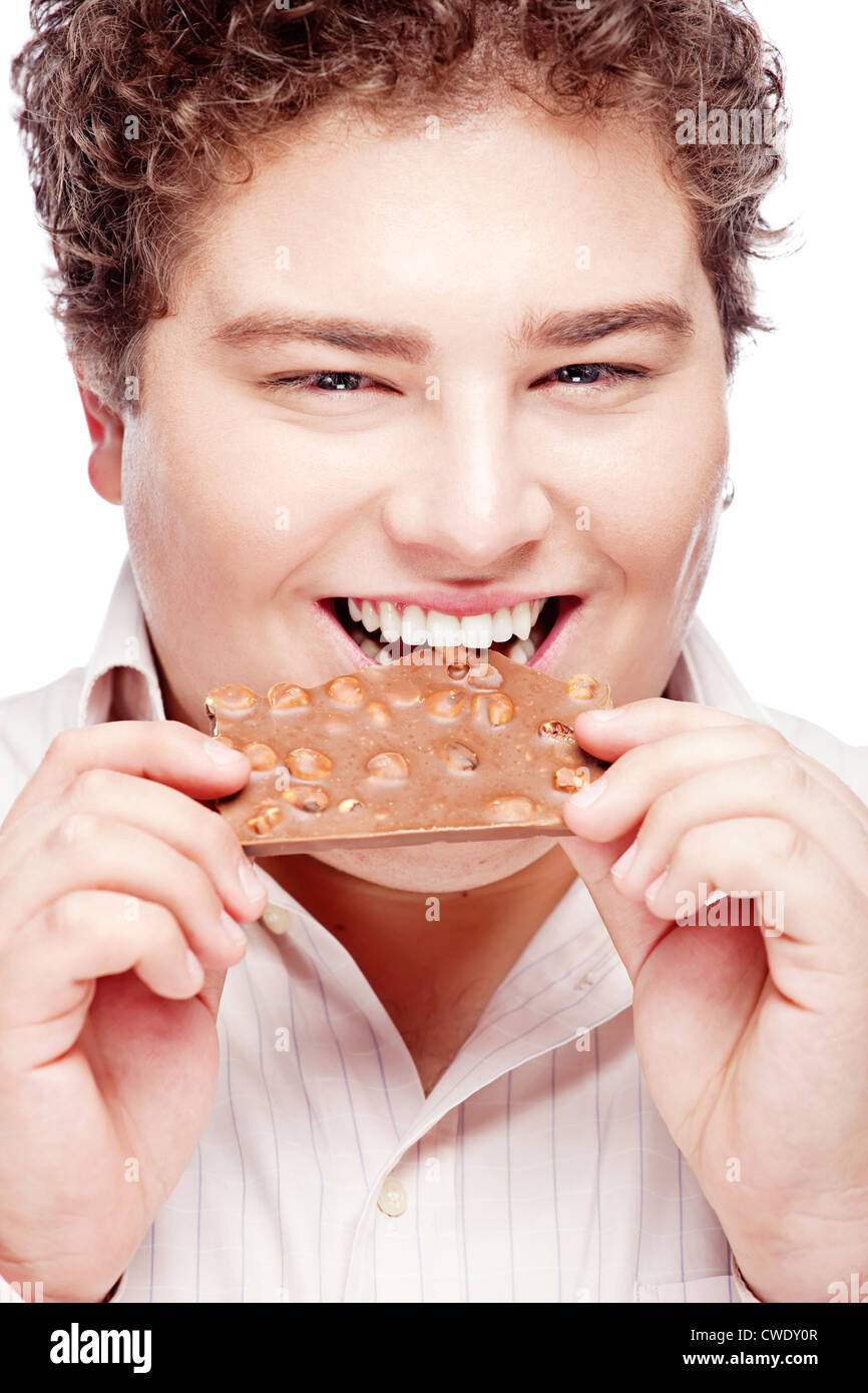 Happy fat man eating chocolate hi-res stock photography and images - Alamy