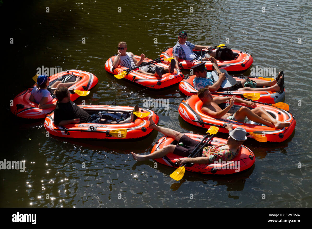 Inflatable boat gathering Stock Photo - Alamy