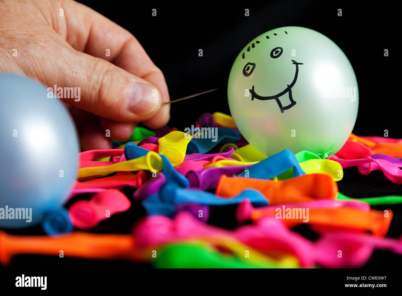 Balloon pop pin hi-res stock photography and images - Alamy