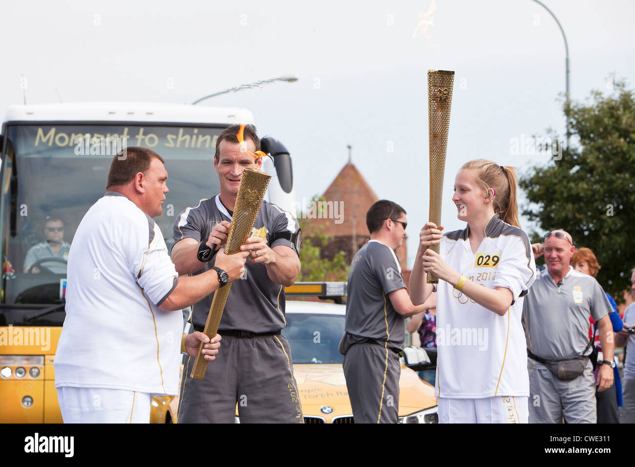 Torch changeover during the London 2012 Olympic torch relay in Great ...