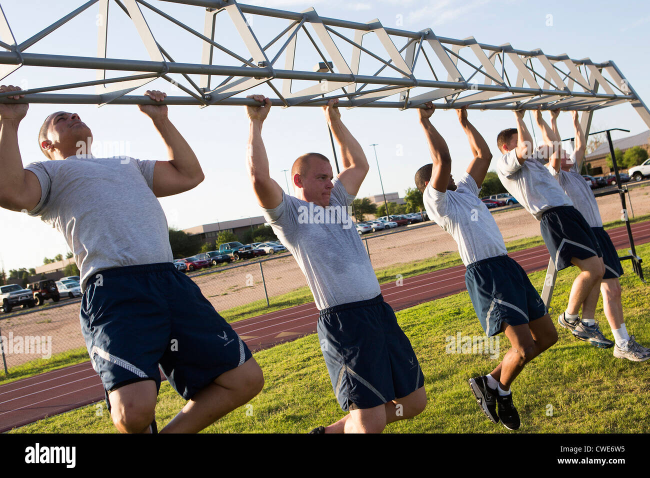 Air Force personnel participate in morning physical training at Davis ...