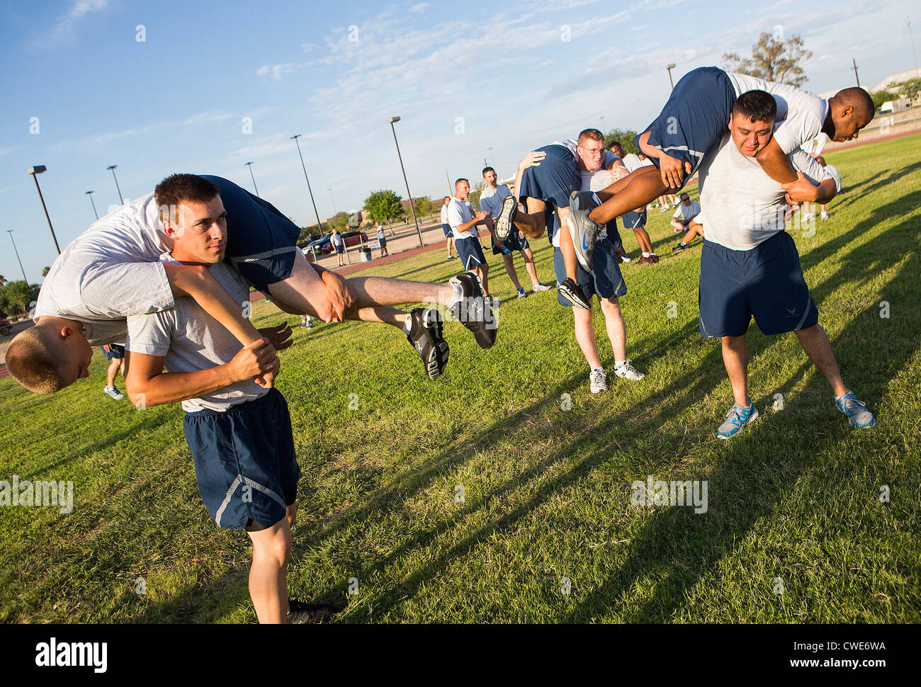 Air Force personnel participate in morning physical training at Davis ...