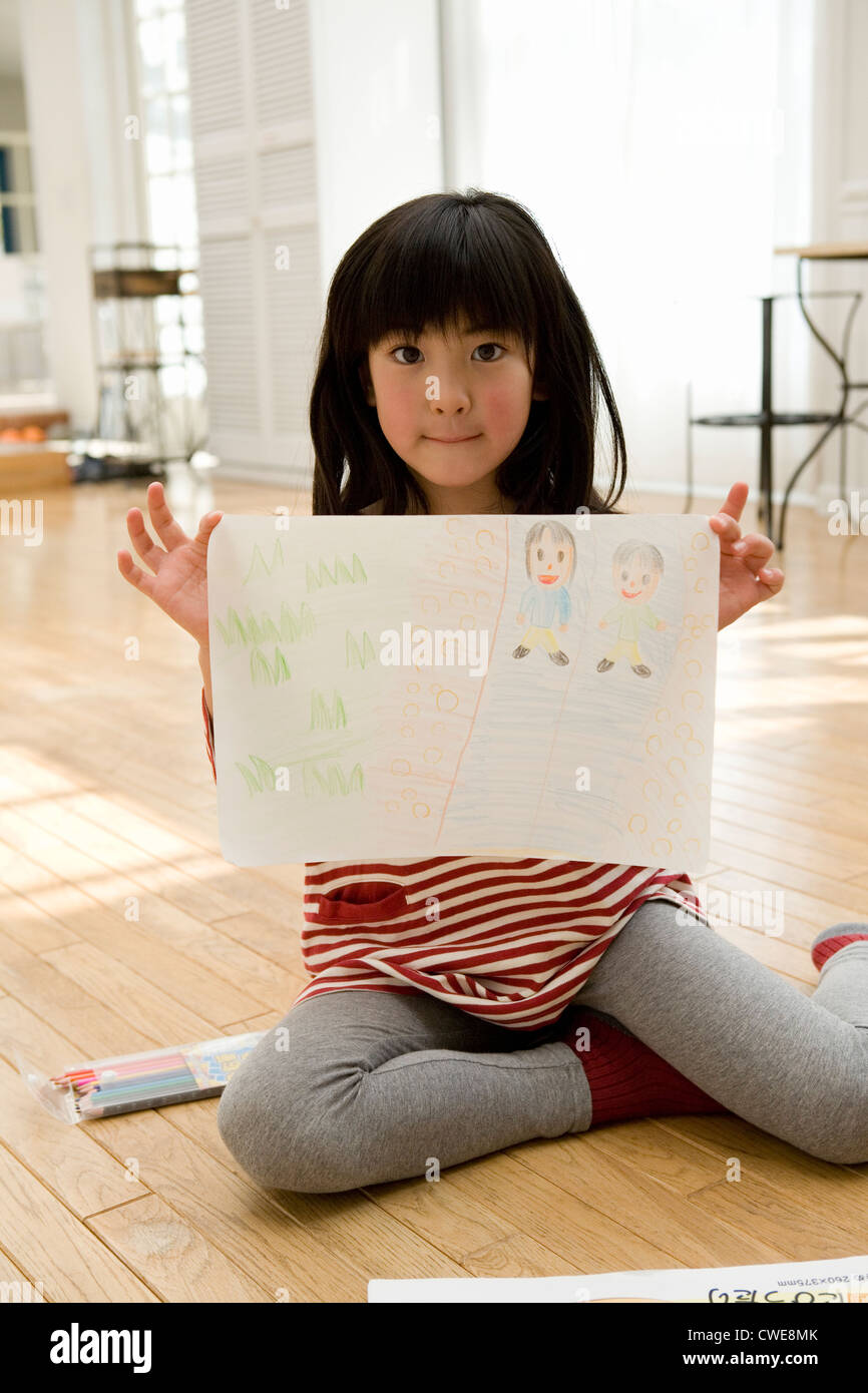 Girl showing picture Stock Photo - Alamy