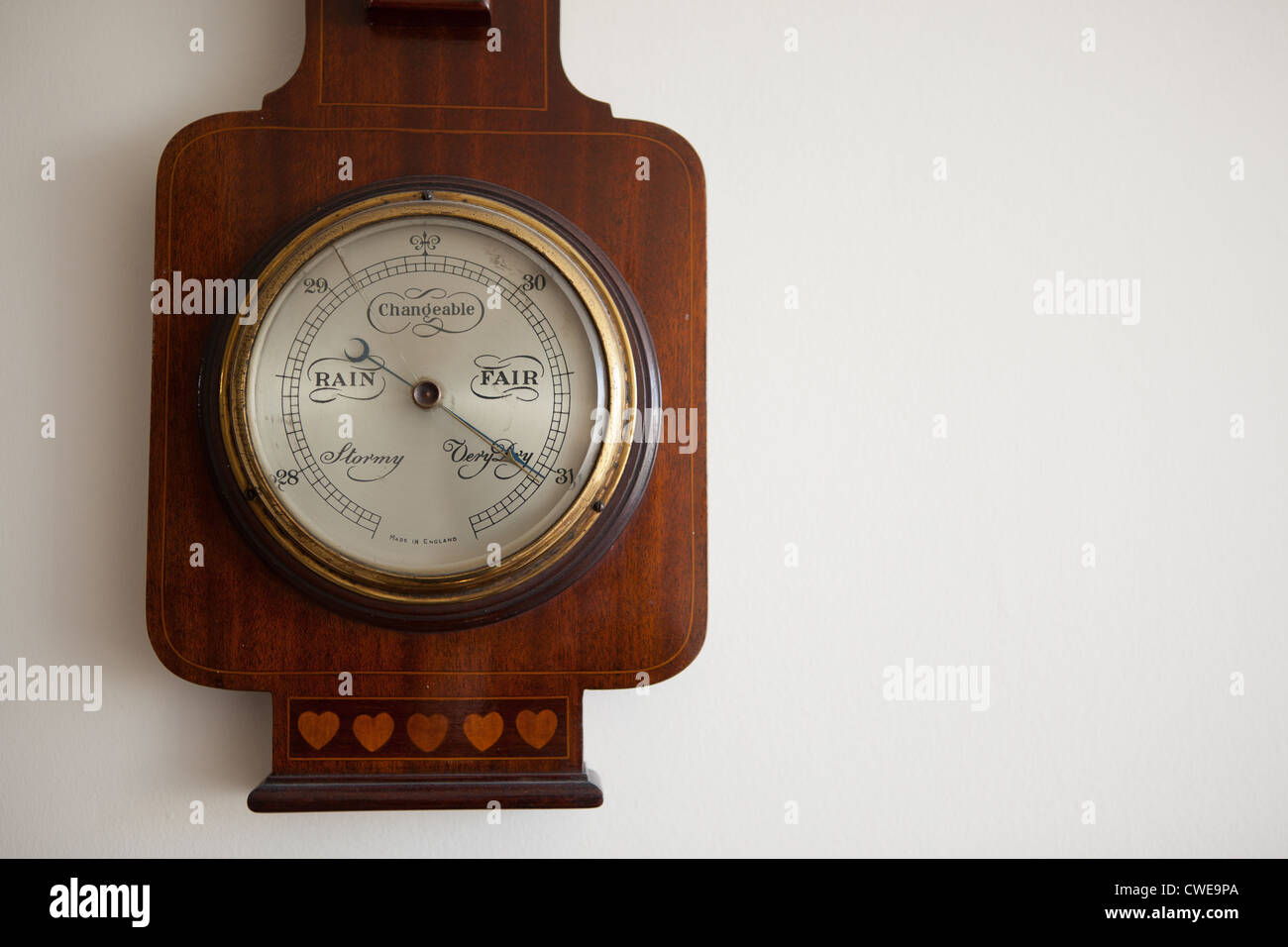 Traditional wooden framed barometer Stock Photo - Alamy
