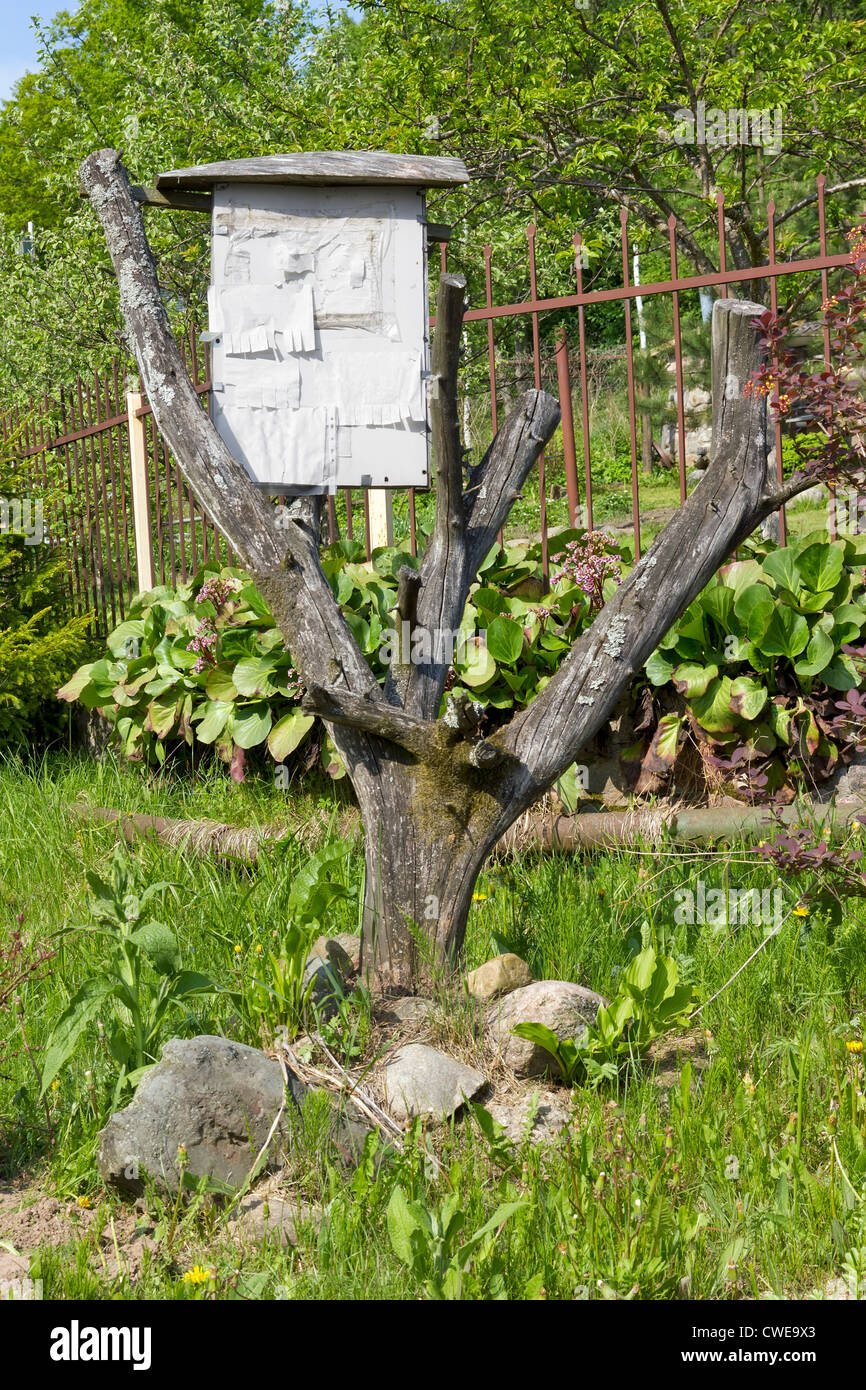 Villlage rustic rural billboard made from dry apple tree. Selective ...