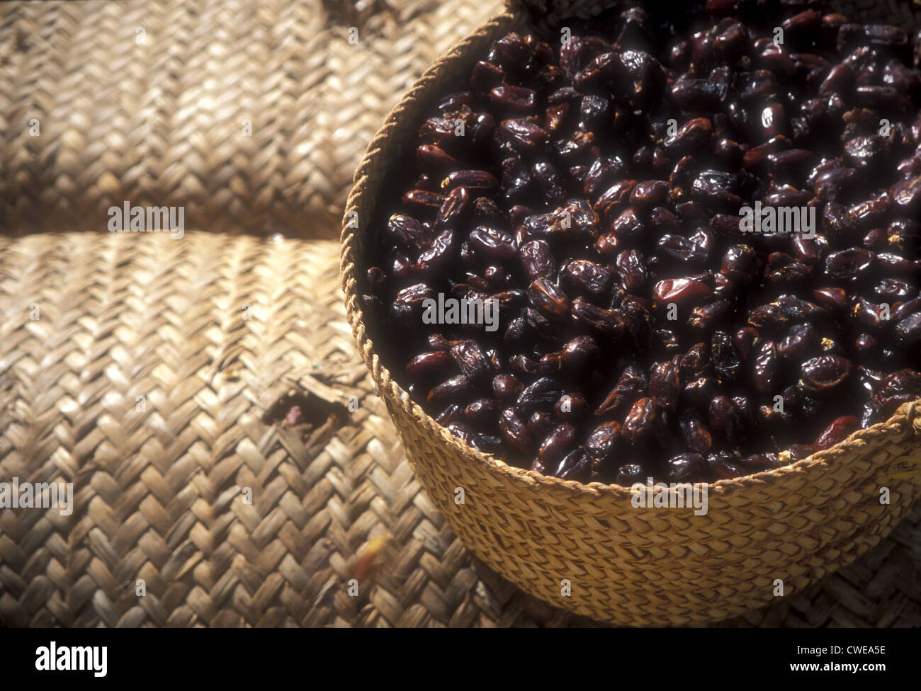 Basket of fresh dates in a desert market in Oman Stock Photo - Alamy