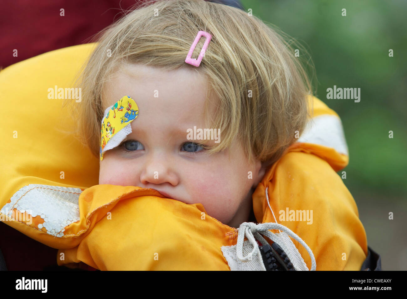Small child with patch Stock Photo - Alamy