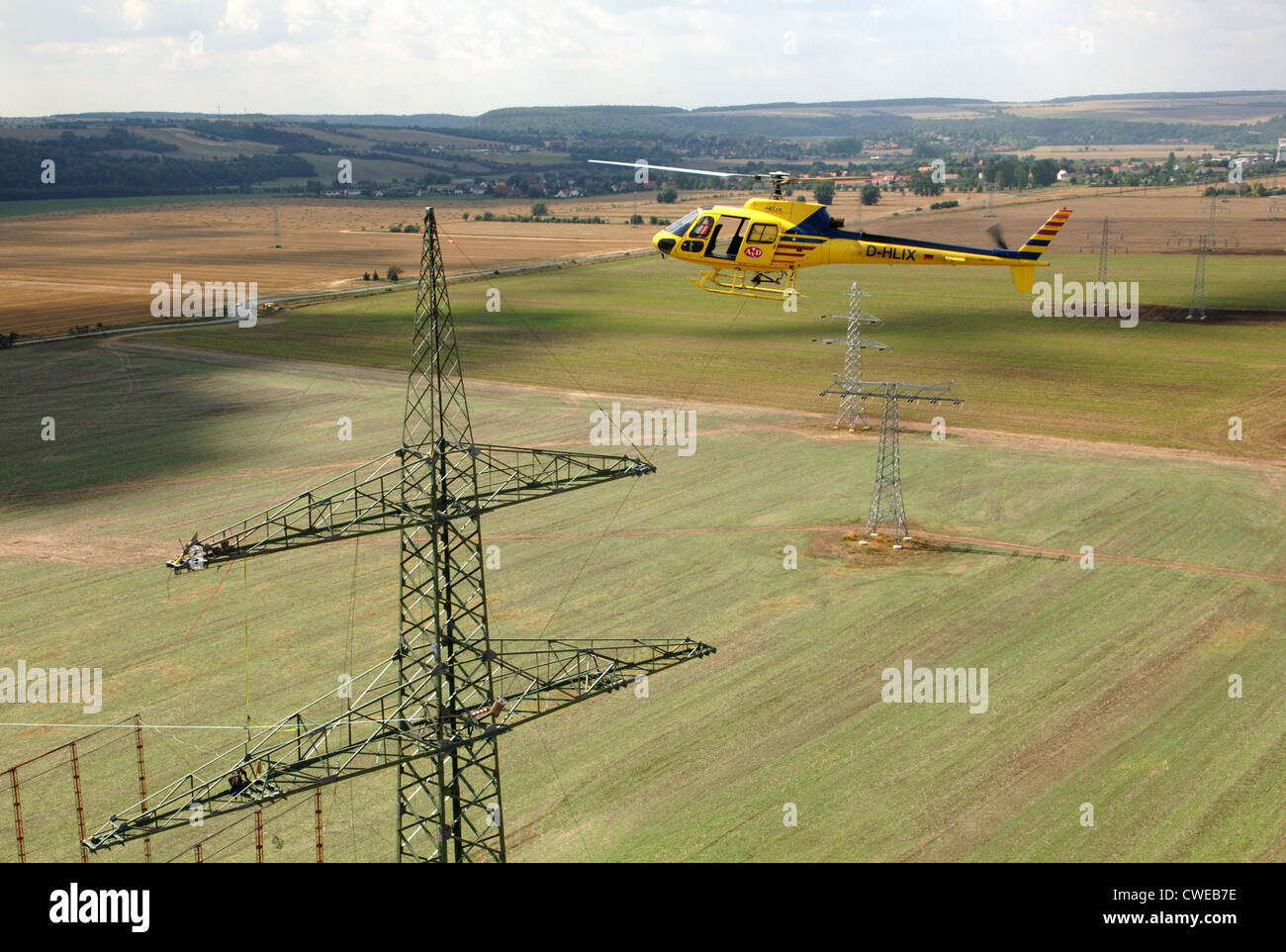 Freyburg, power line installation with a helicopter Stock Photo - Alamy