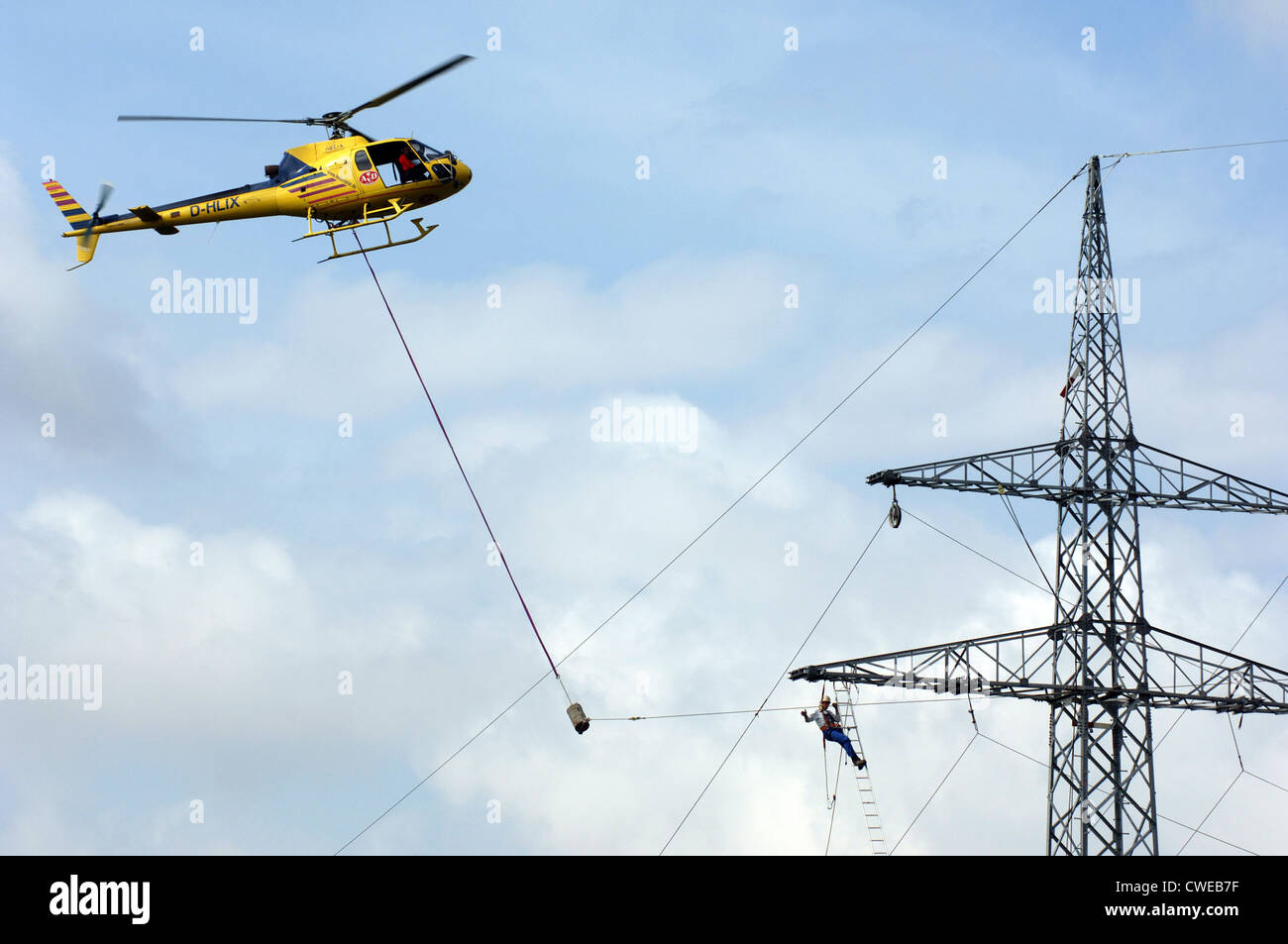 Freyburg, power line installation with a helicopter Stock Photo - Alamy