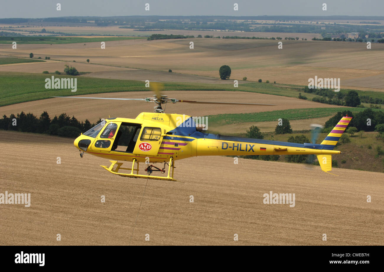 Freyburg, power line installation with a helicopter Stock Photo - Alamy