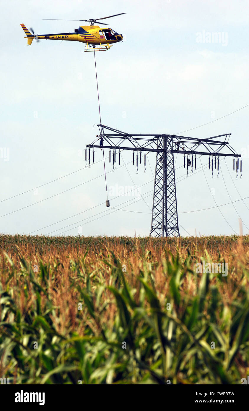 Freyburg, power line installation with a helicopter Stock Photo - Alamy