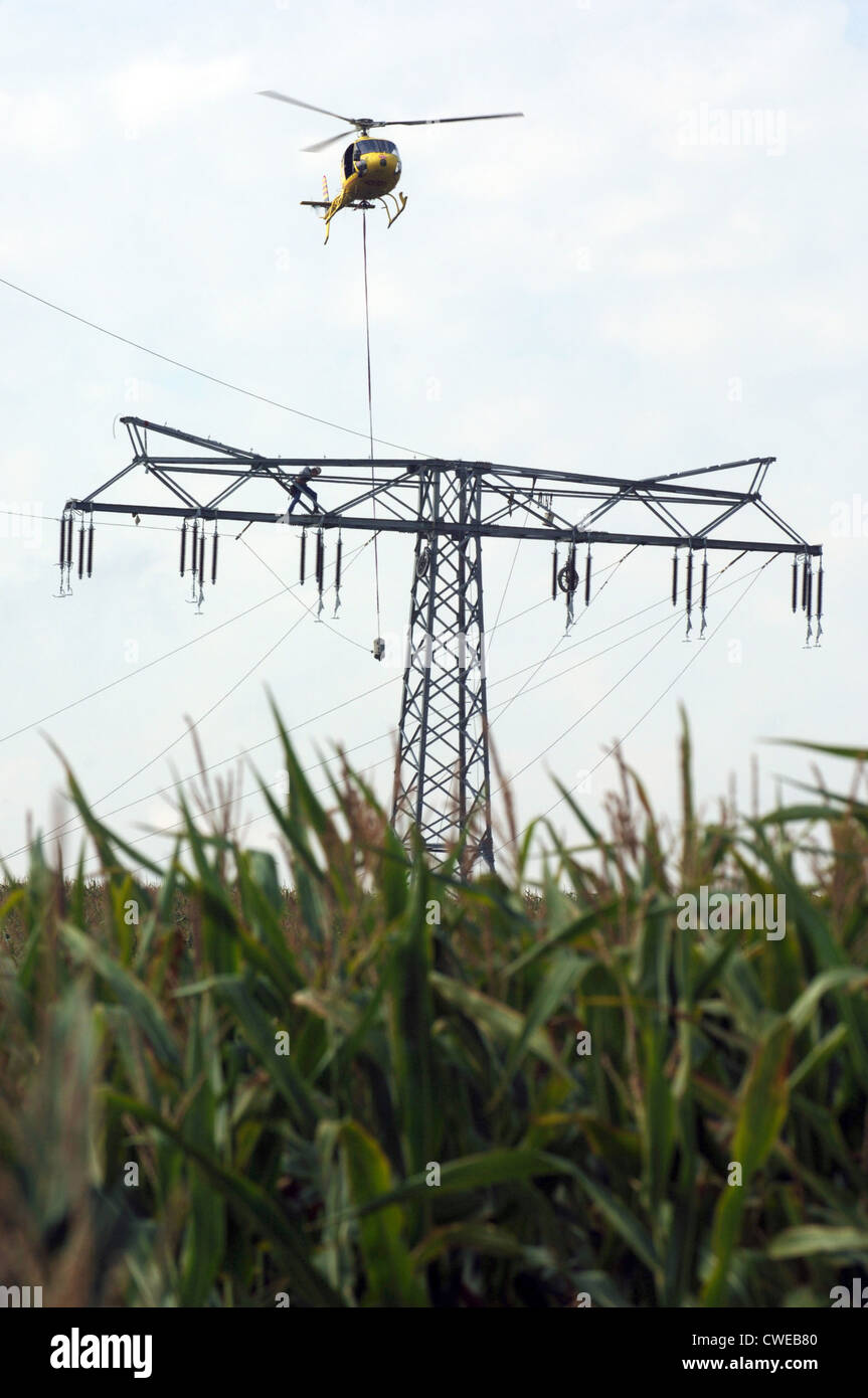 Freyburg, power line installation with a helicopter Stock Photo - Alamy