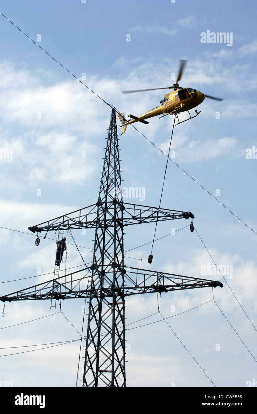 Freyburg, power line installation with a helicopter Stock Photo - Alamy