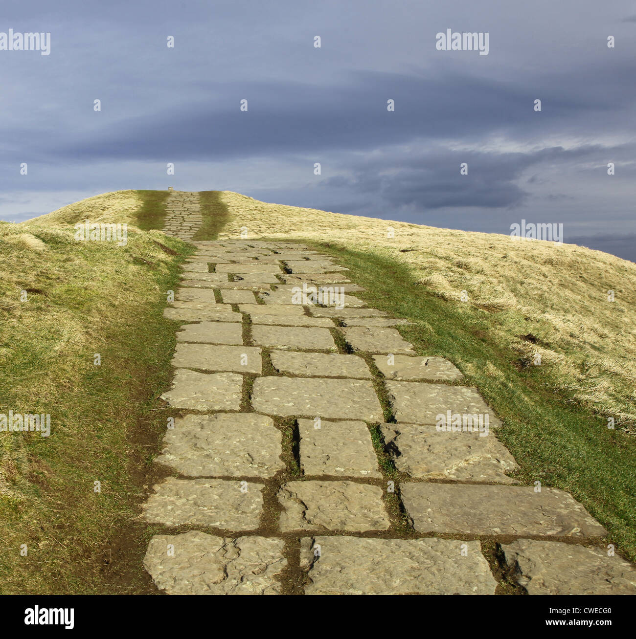 A paved path at the top of Mam Tor Castleton in the High Peak of ...