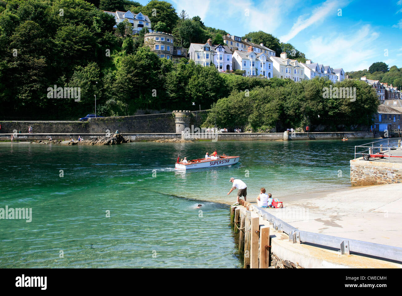 Entrance to the River Looe and the breakwater in Cornwall Stock Photo ...
