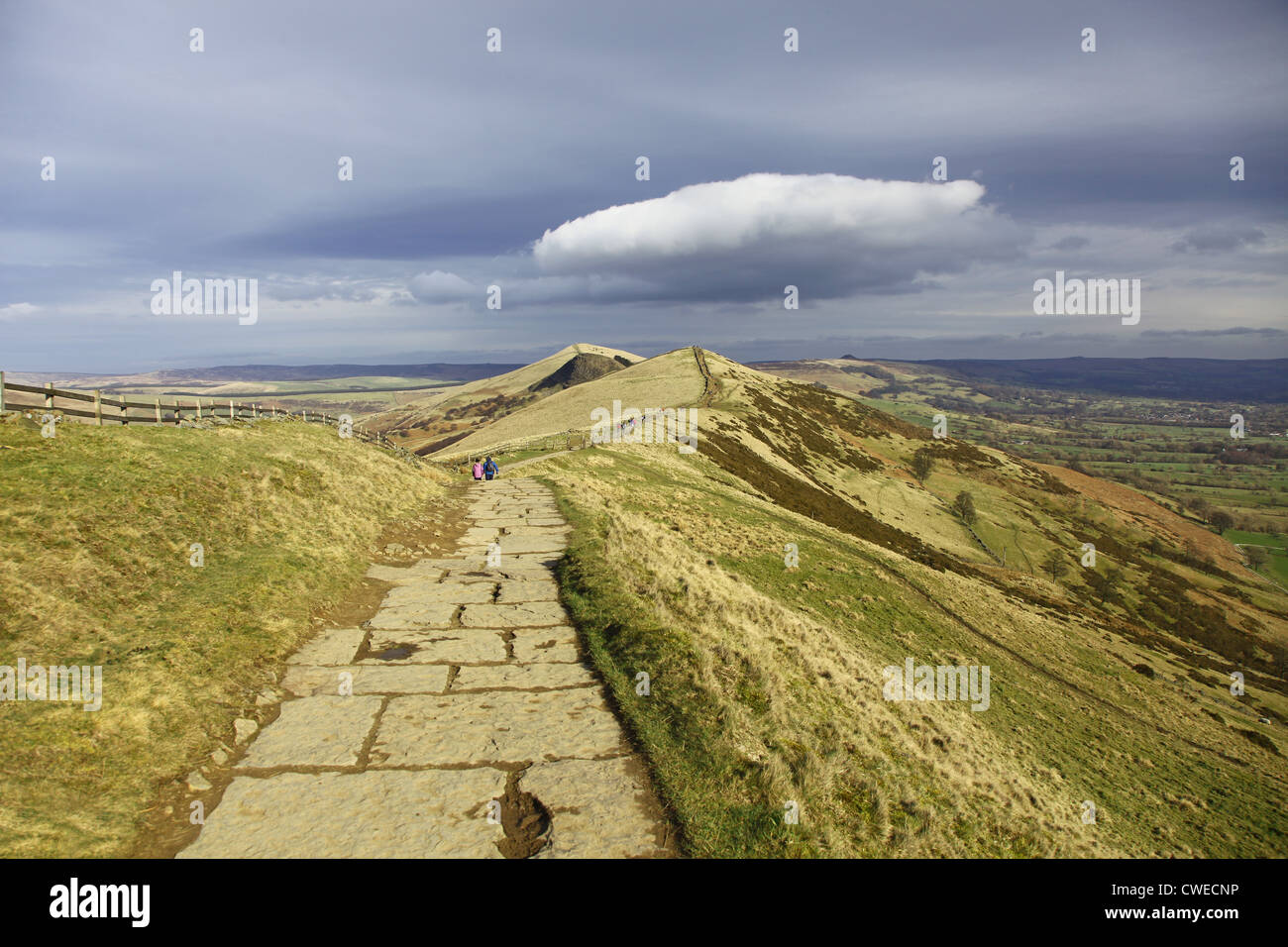 A paved path at the top of Mam Tor Castleton in the High Peak of ...