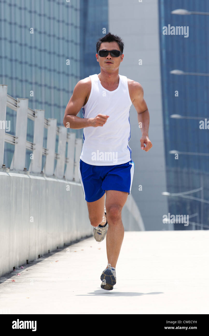 Asian male runner Stock Photo - Alamy