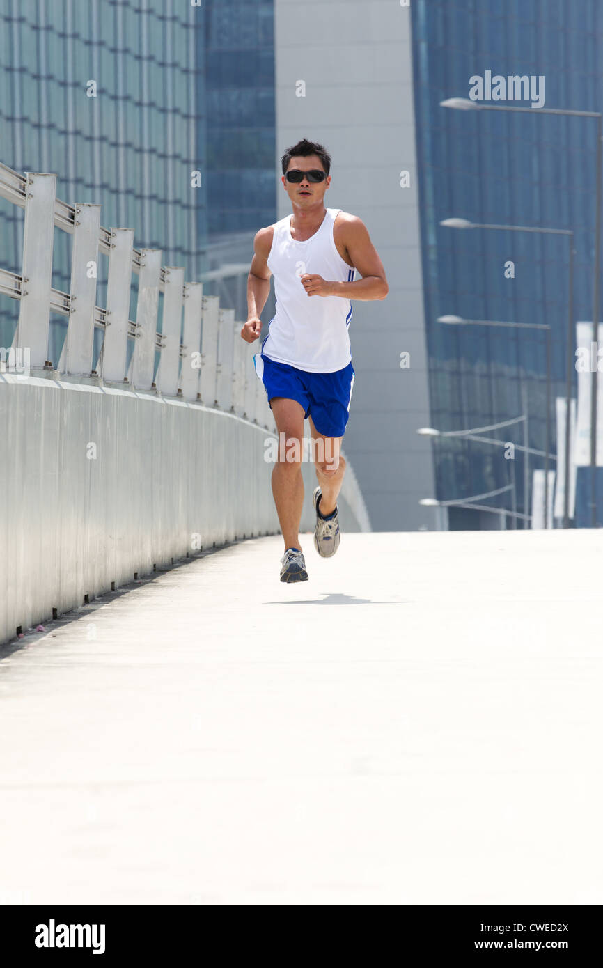 Asian male runner Stock Photo - Alamy
