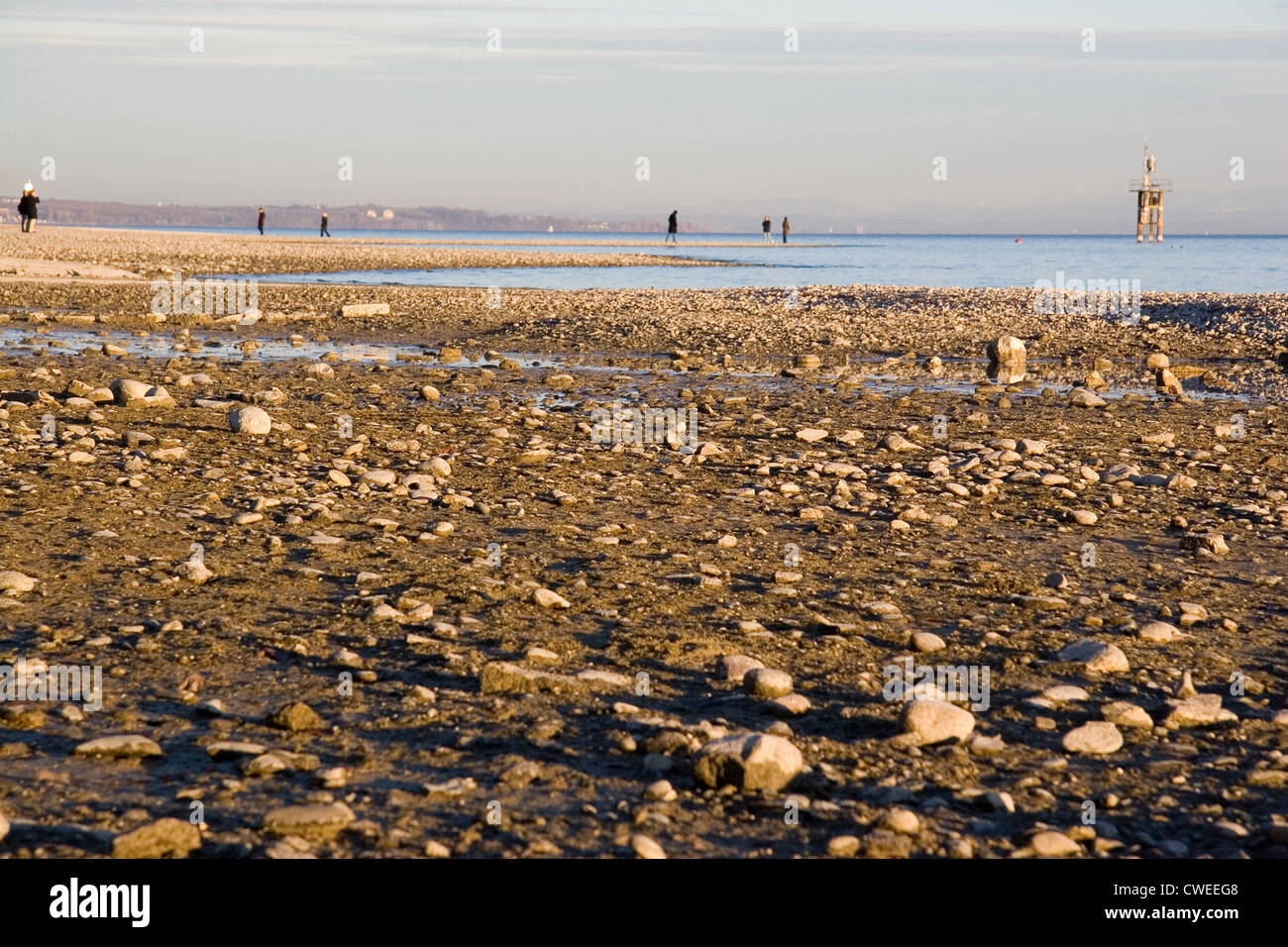 Constance, walkers on the beach of Lake Constance Stock Photo - Alamy