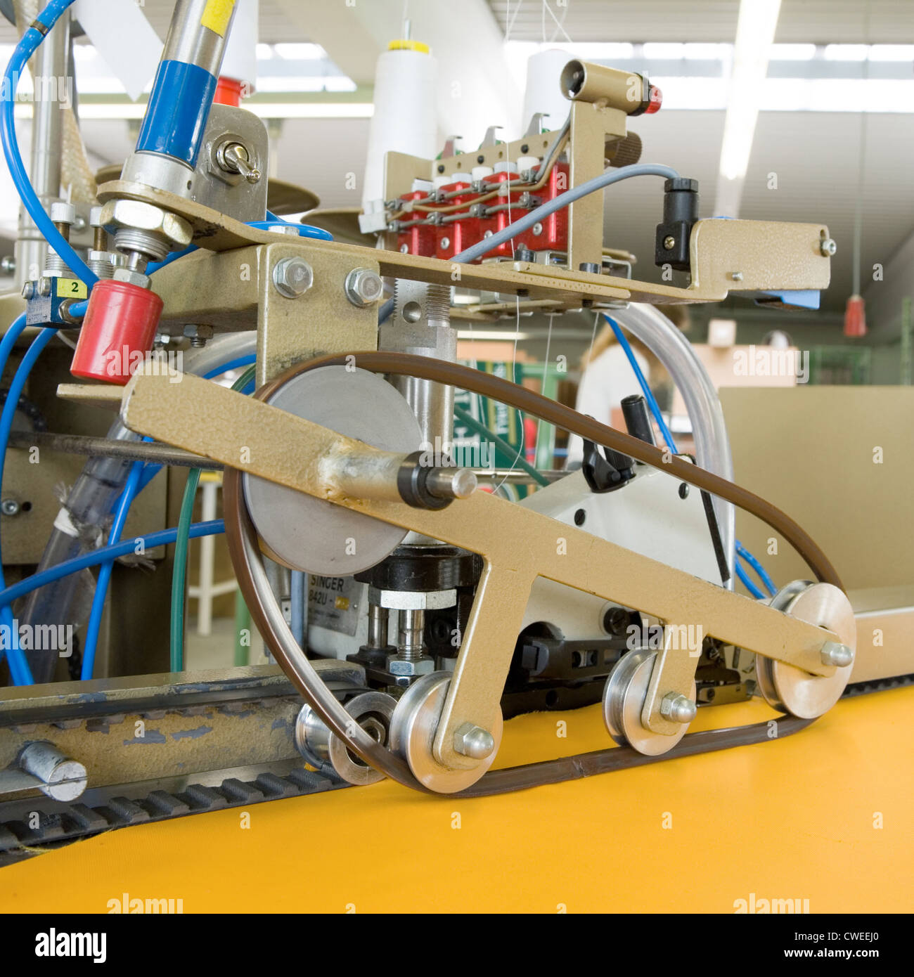 Quantities, factory sewing machine Stock Photo - Alamy