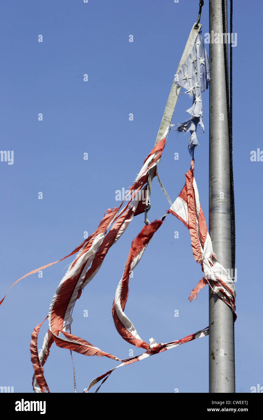 Ripped torn tattered american flag hi-res stock photography and images ...