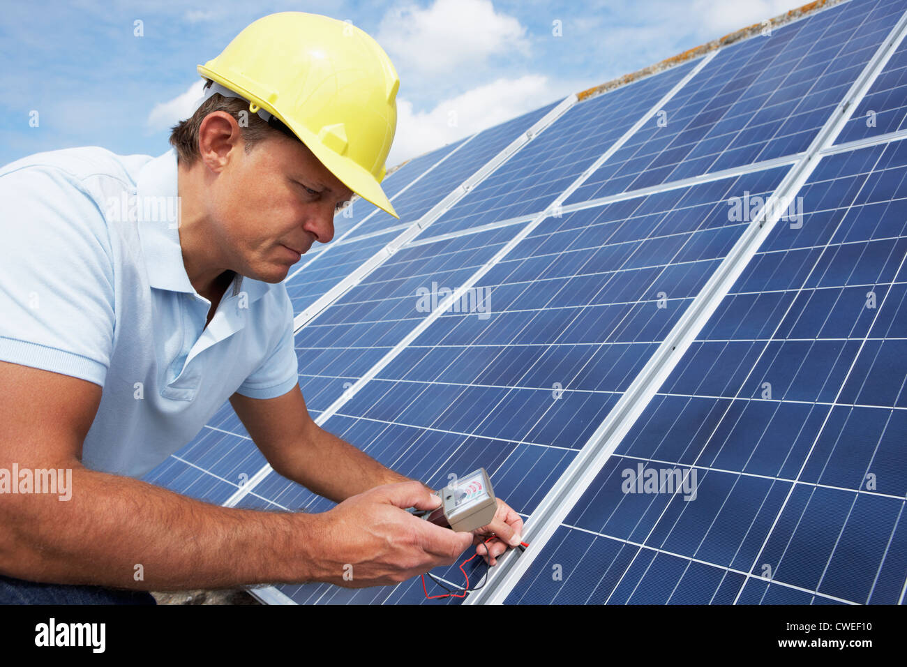 Man installing solar panels Stock Photo - Alamy Man installing solar panels Stock Photo - Alamy