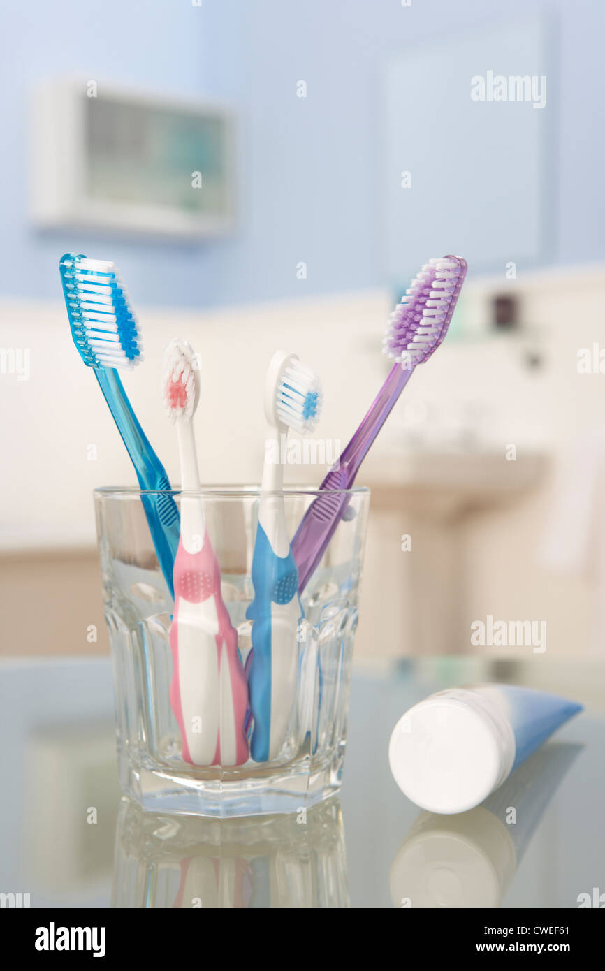 Toothbrushes and toothpaste Stock Photo - Alamy