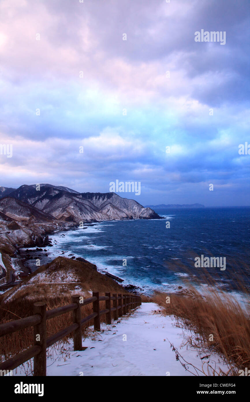 Beautiful Beach Scene With Cliff In Background Stock Photo - Alamy