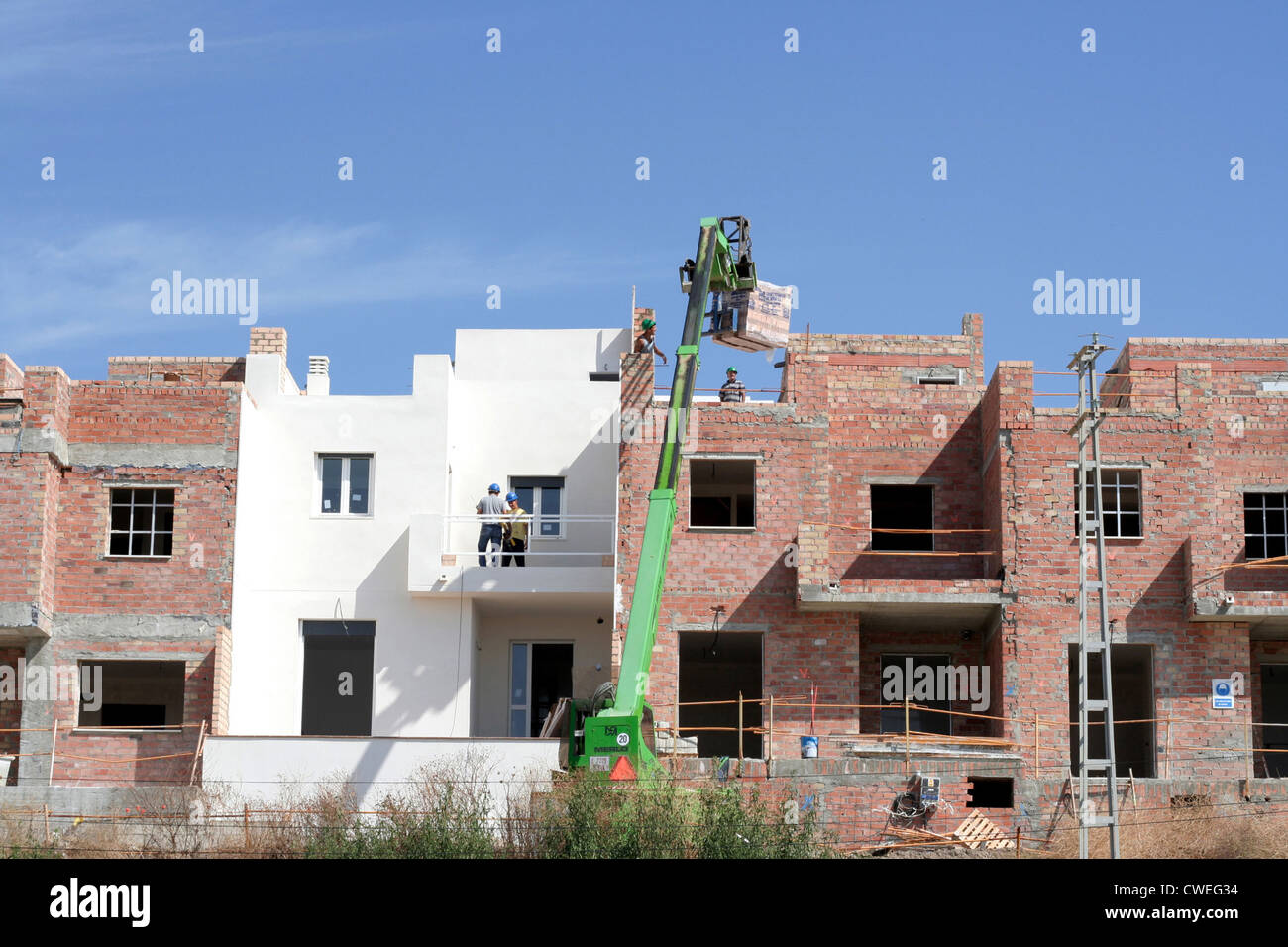 Construction of row houses Stock Photo - Alamy