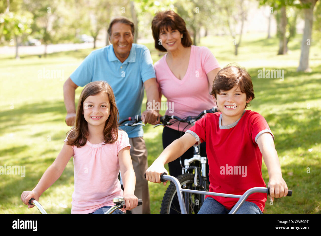Family riding bikes hi-res stock photography and images - Alamy