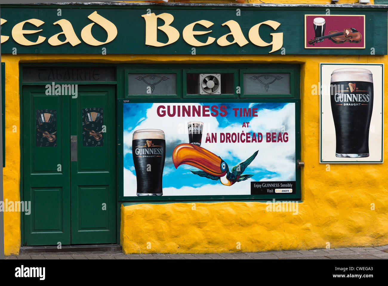 Pub Door With Guinness Sign High Resolution Stock Photography and ...