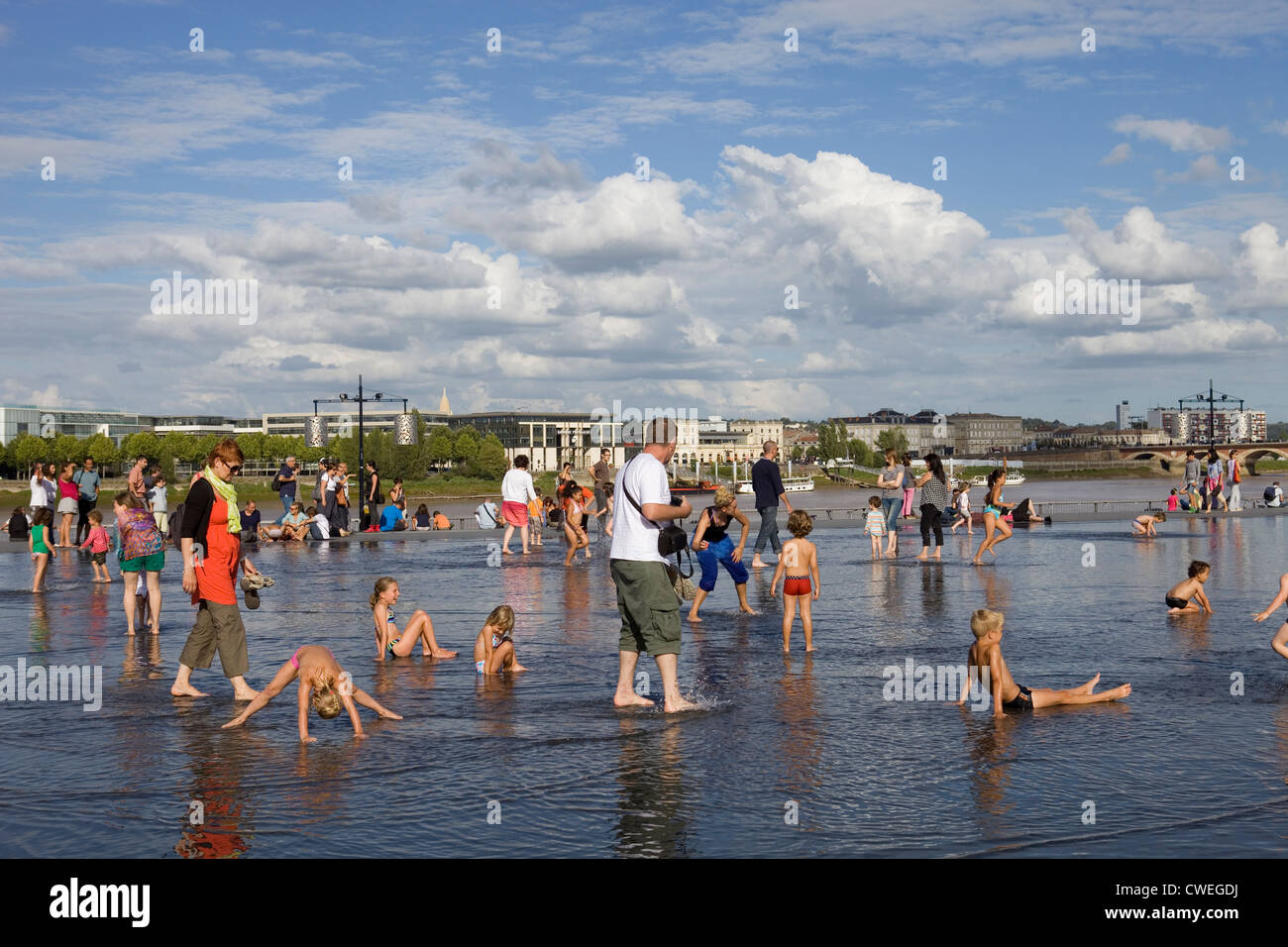 The Famous Bordeaux water mirror full of people having fun in the water ...