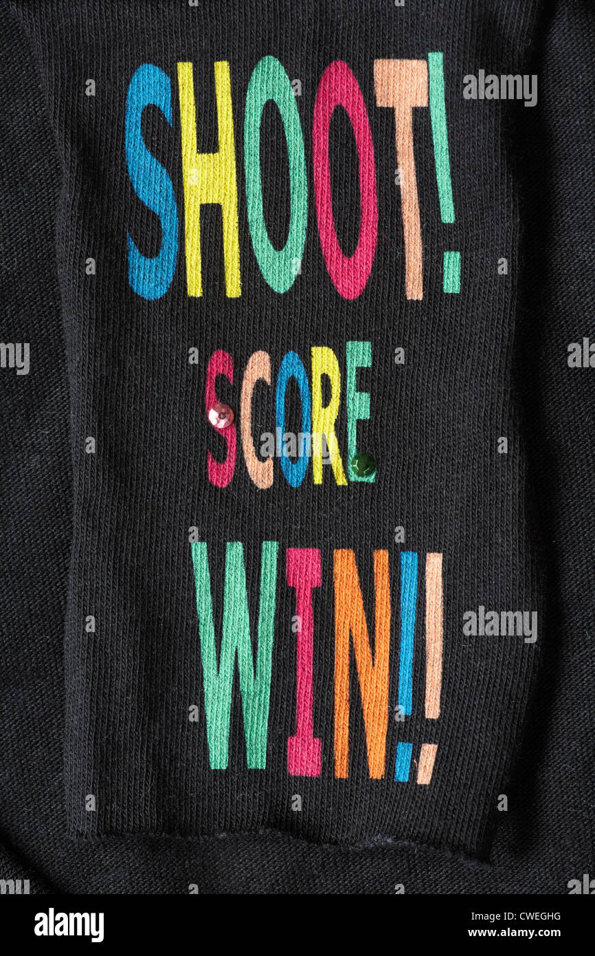 shoot score win detail on black top Stock Photo - Alamy
