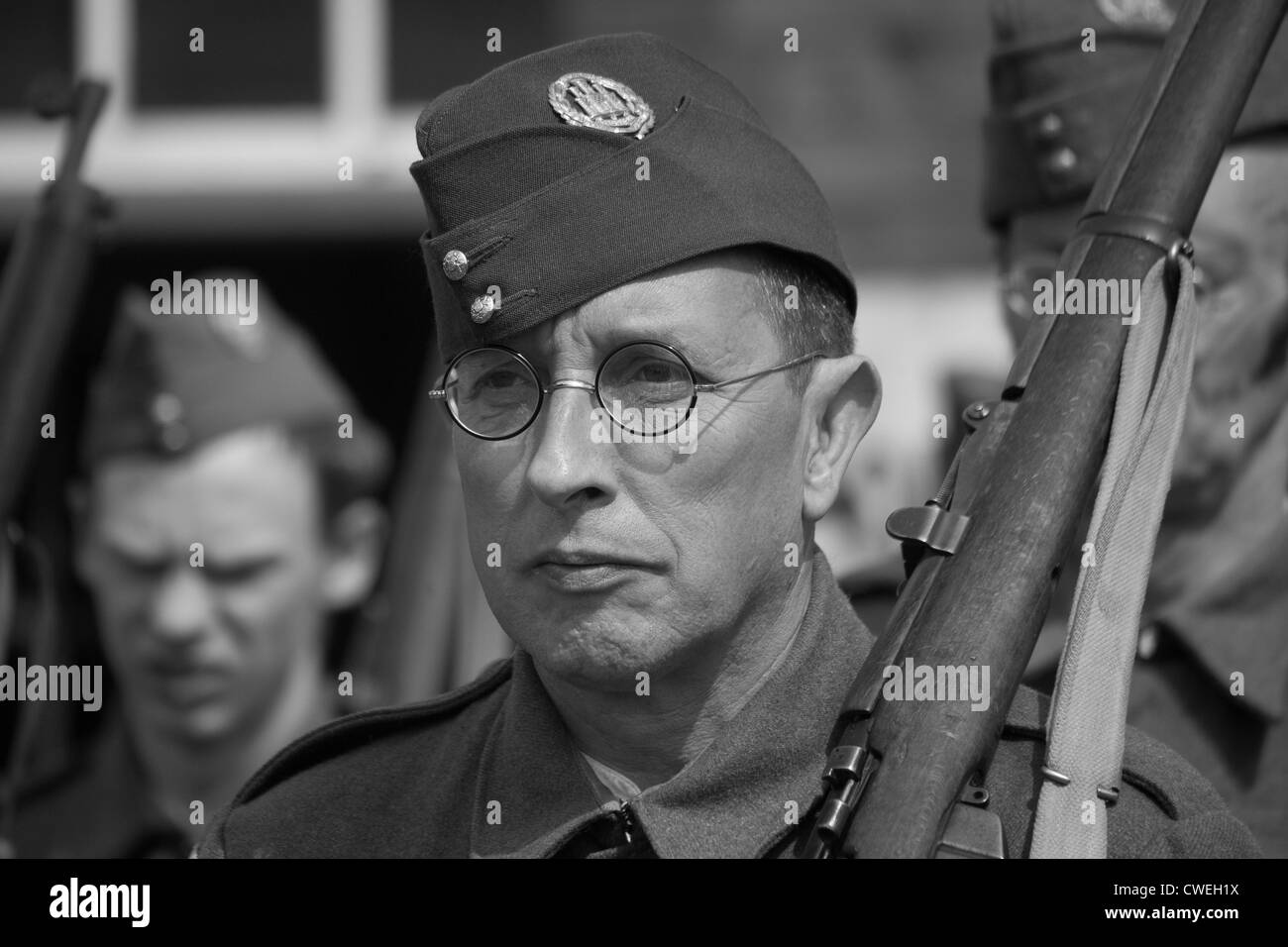 Home Guard member with shouldered rifle Stock Photo - Alamy