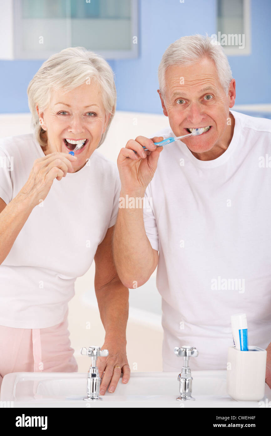 Senior couple brushing teeth Stock Photo - Alamy