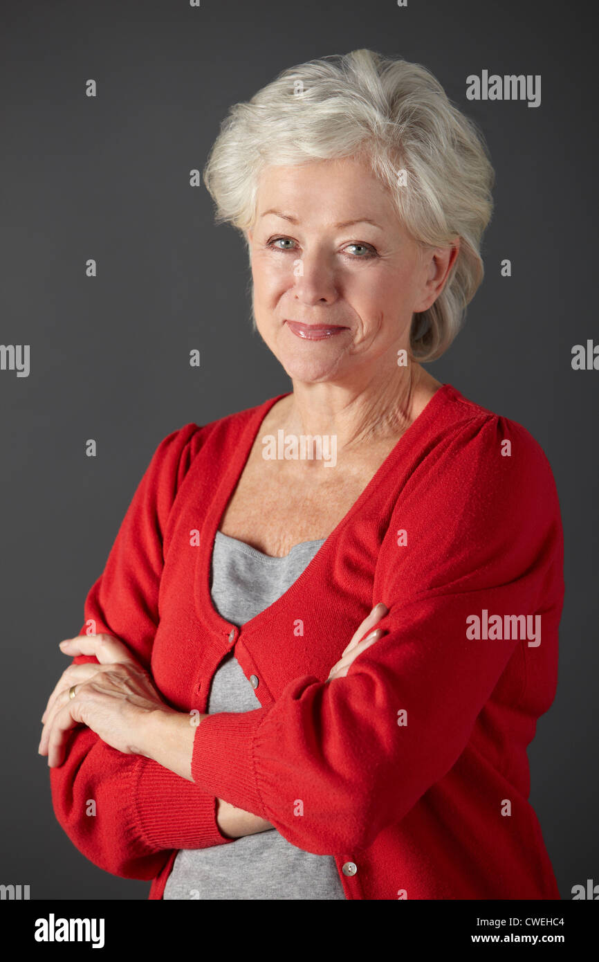 Senior woman studio portrait Stock Photo - Alamy