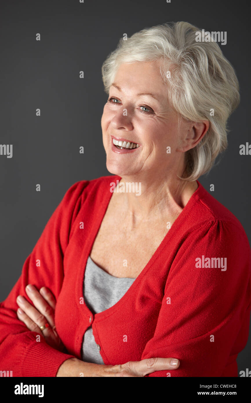 Senior woman studio portrait Stock Photo - Alamy