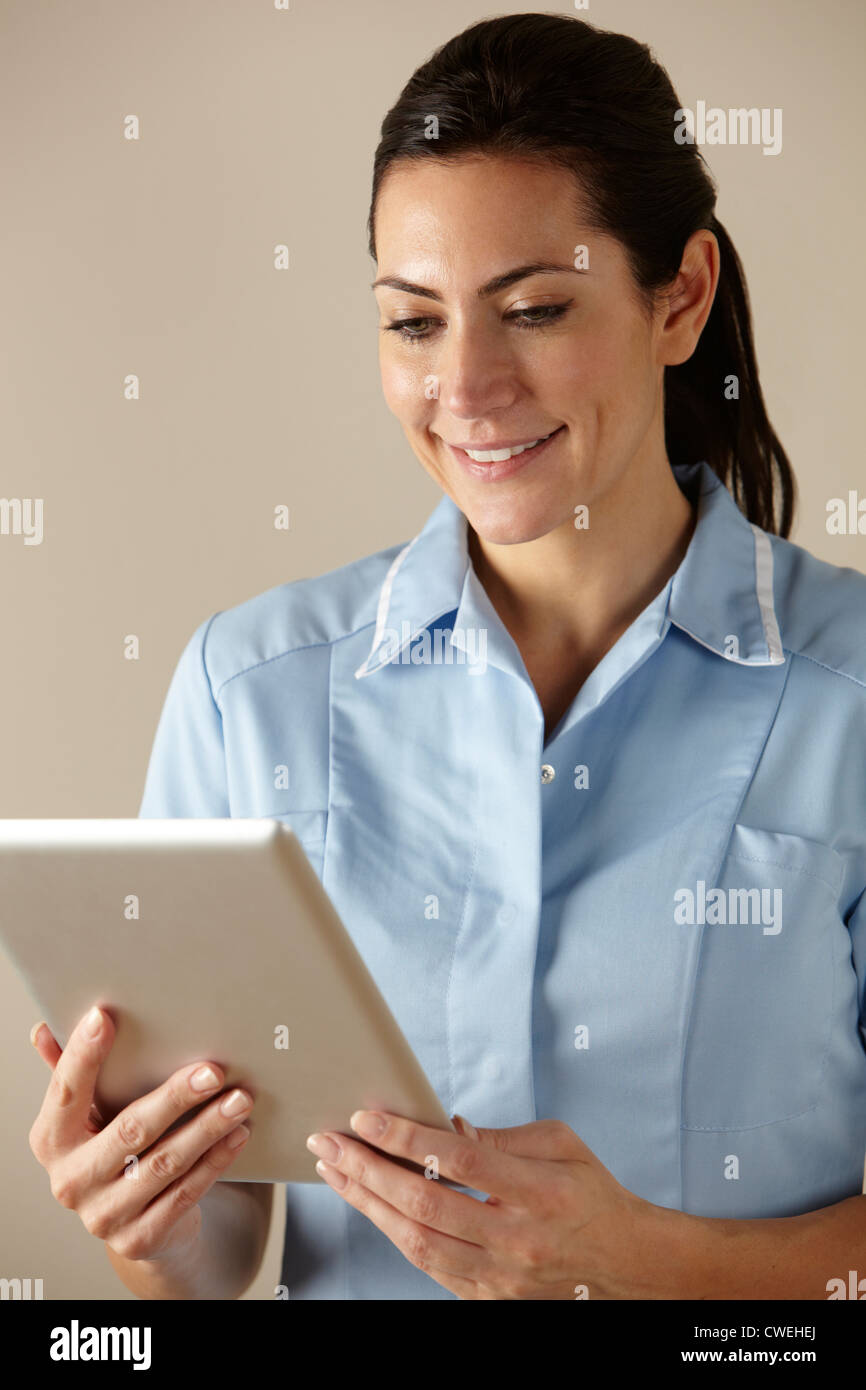 UK nurse using computer tablet Stock Photo - Alamy