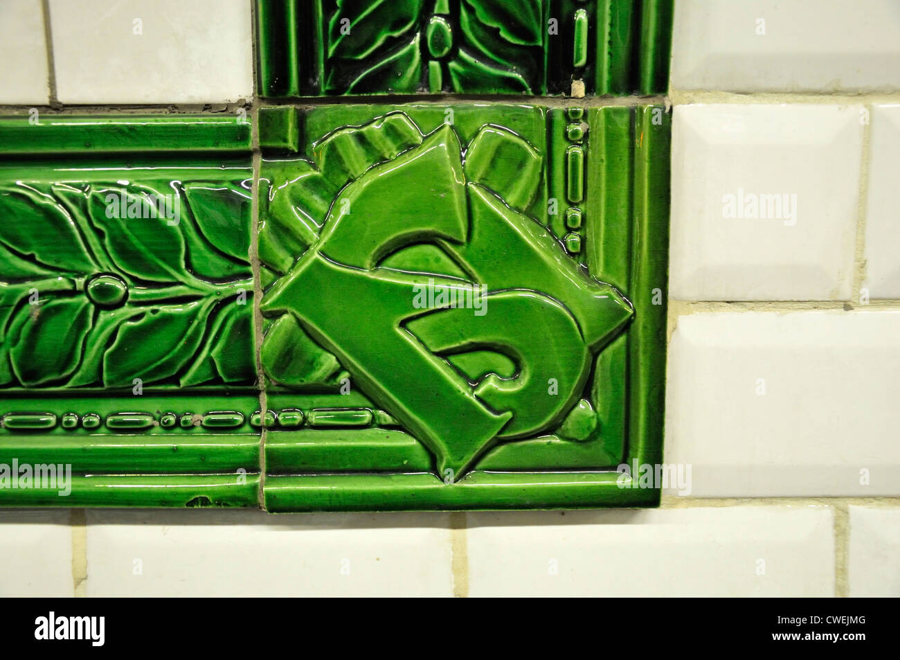 Paris, France. Metro station: Place de Clichy. Ceramic tile detail: "NS ...