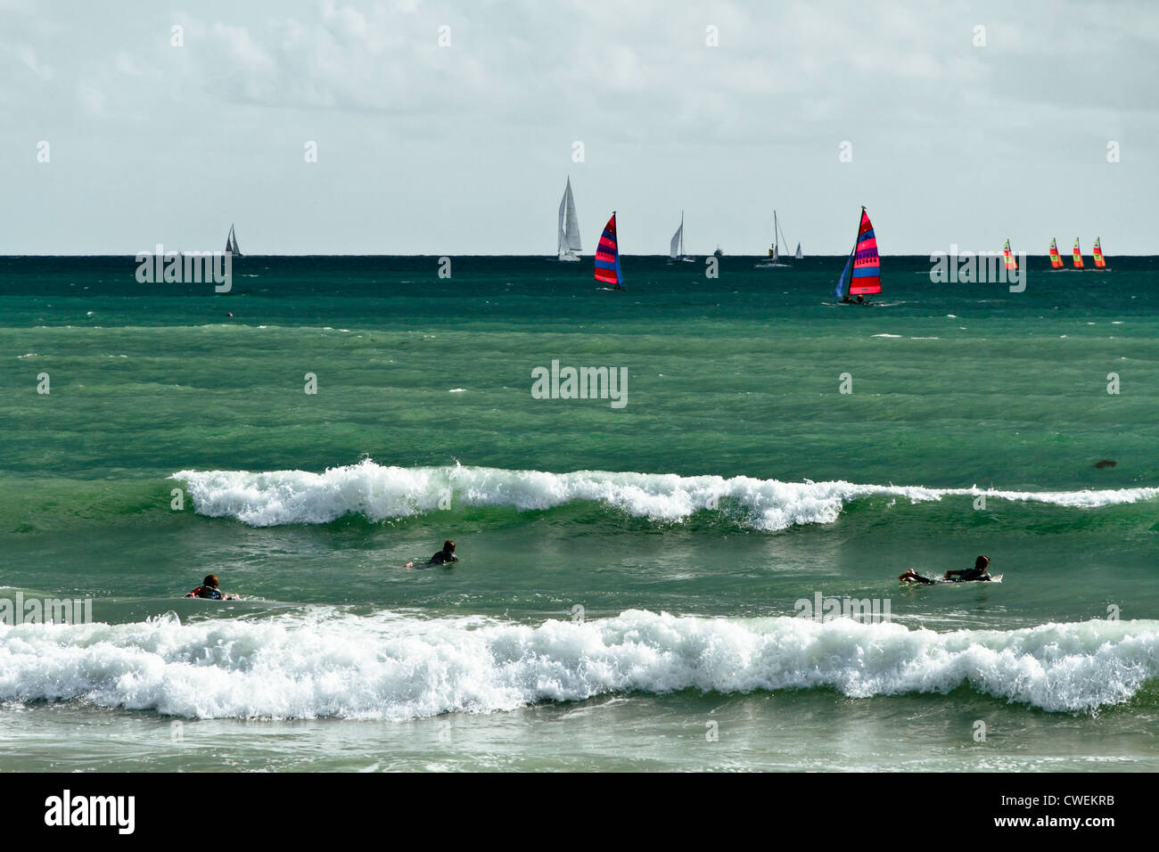 Surfers in sea, France Stock Photo - Alamy