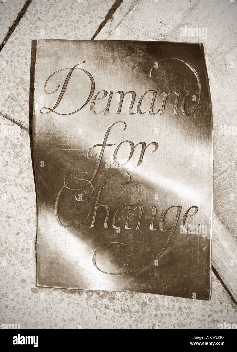 Demand for change written with metallic letters on stone texture Stock ...