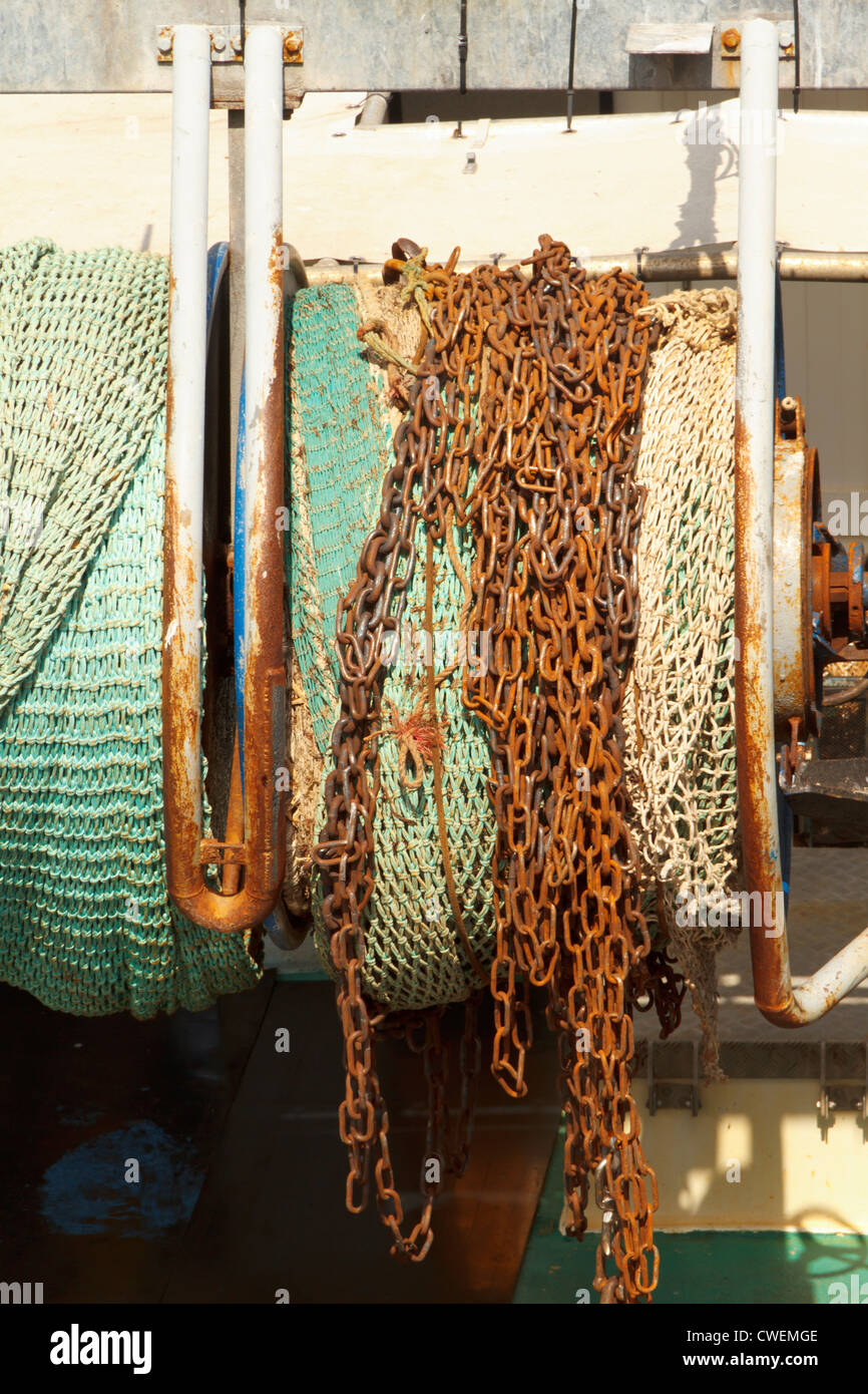 Old rusty chain and fishing net Stock Photo - Alamy
